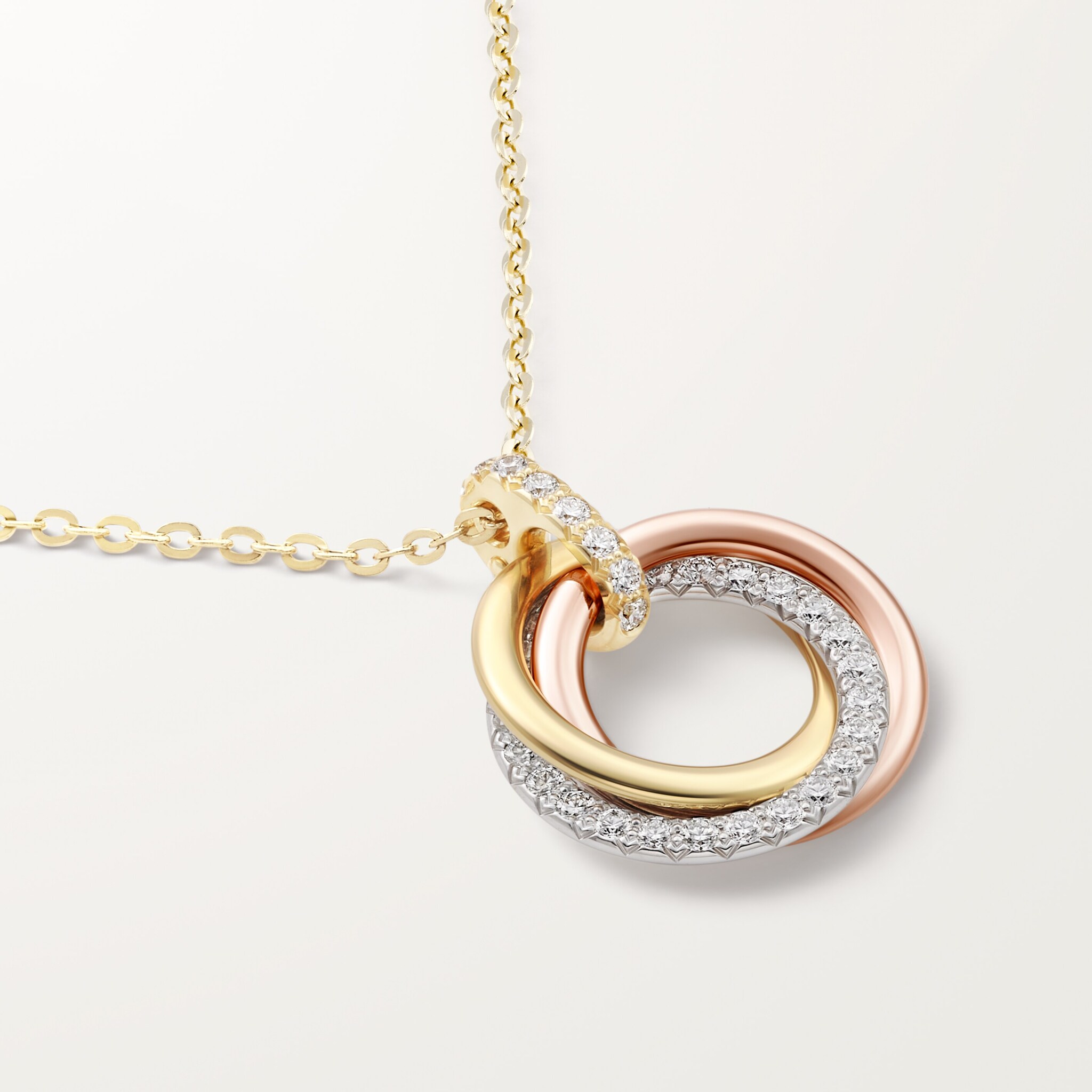 Trinity pendant, small model, half-paved - Necklaces | Cartier KWT