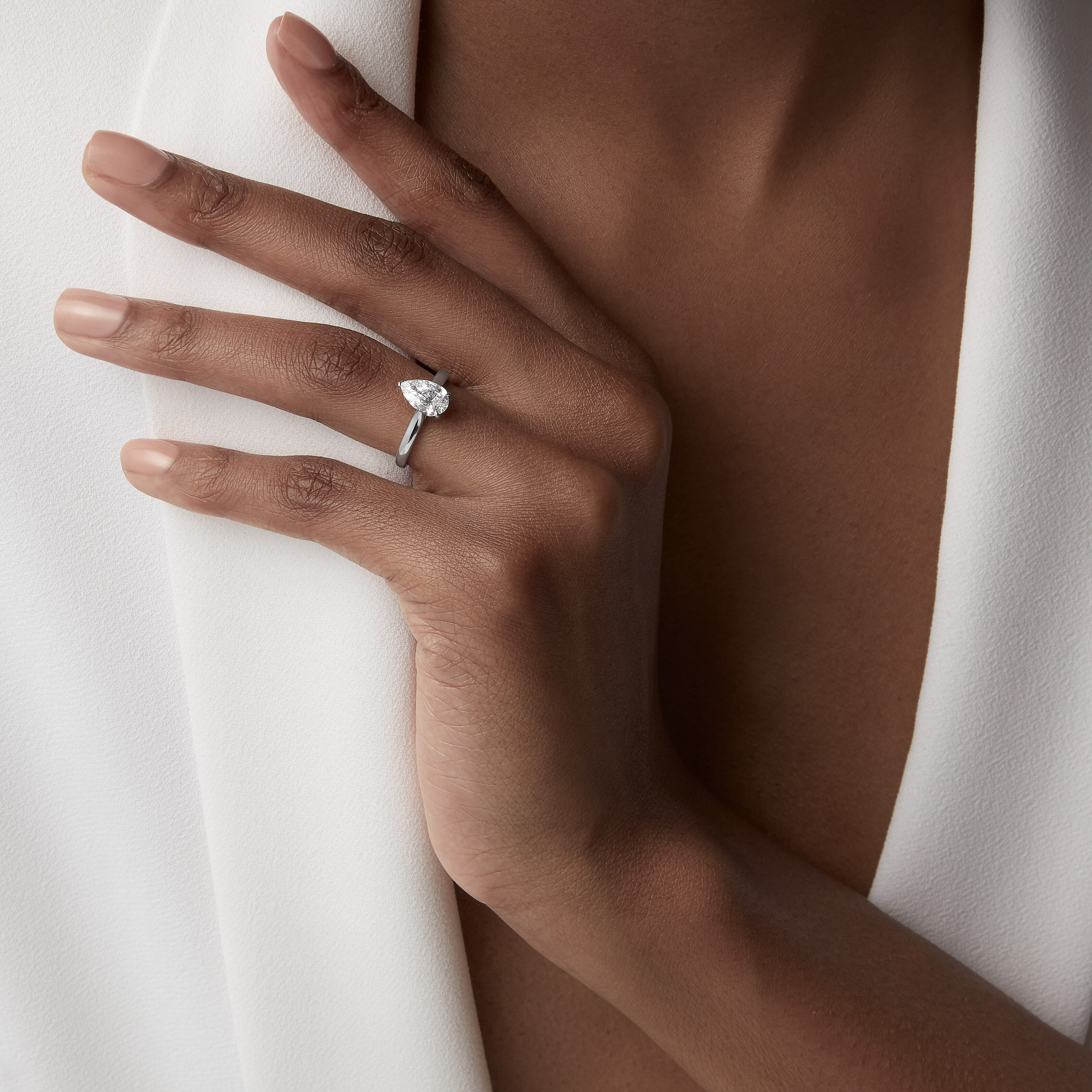 1895 solitaire, pear-shaped diamond