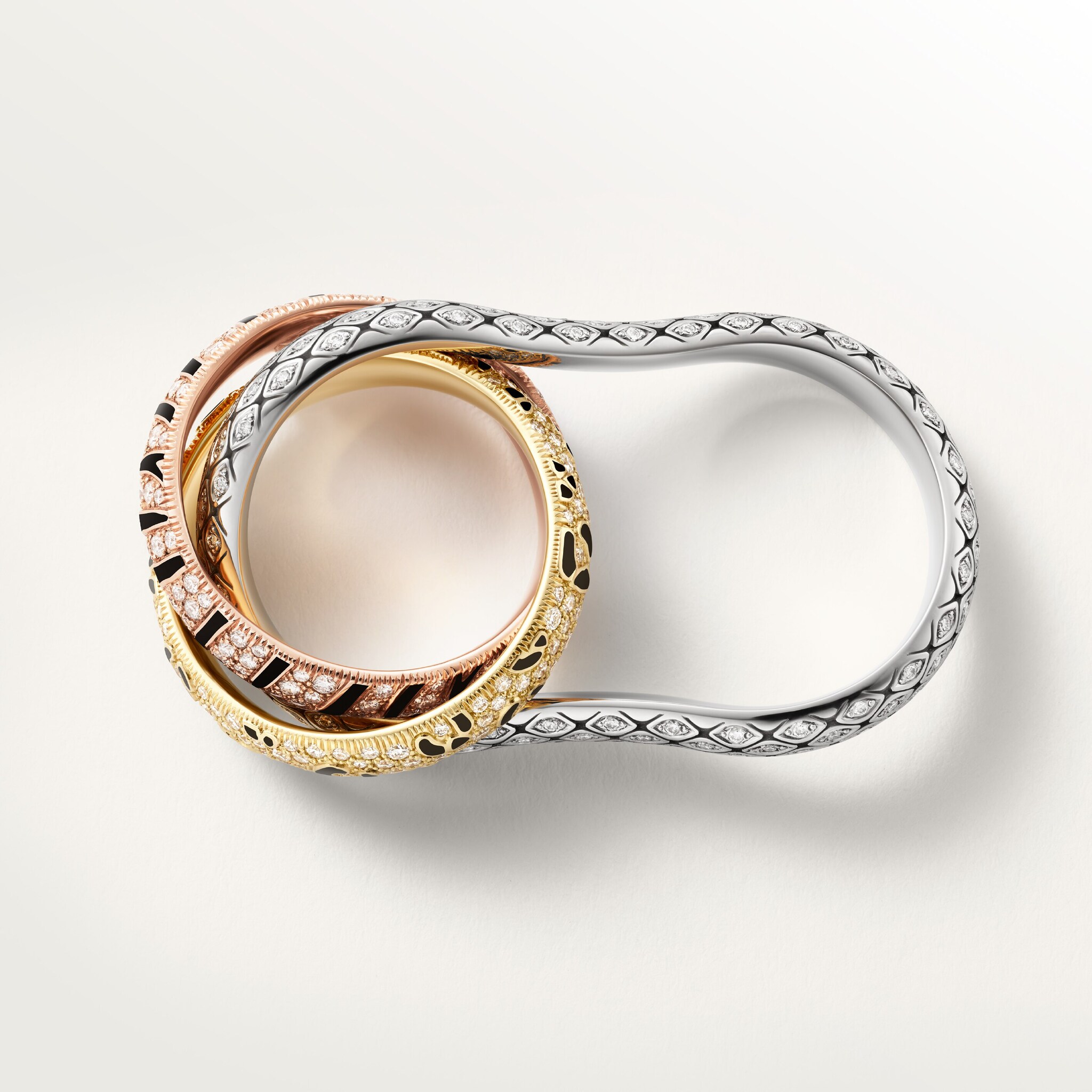 Trinity two-finger ring, lacquer, paved